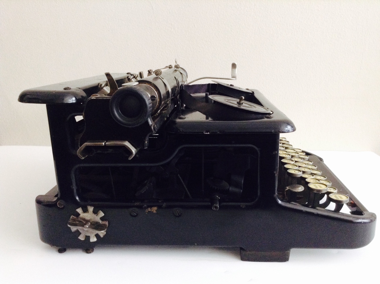 left side with mainspring tension winding key – myoldtypewriter